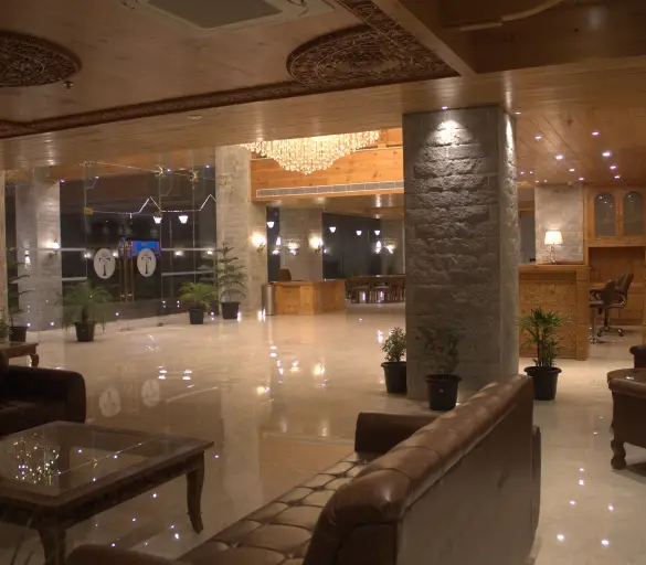 Golden-themed Lobby in Manali - Tiaraa Hotel and Resorts