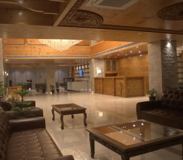 Golden-themed Lobby in Manali - Tiaraa Hotel and Resorts
